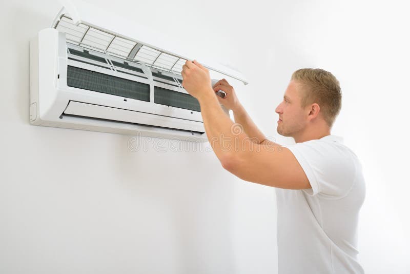 Man Adjusting Air Conditioning System Stock Image - Image of cooler ...