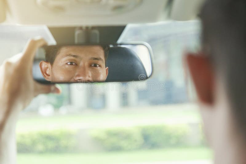 Man Adjusting Car Rear View Mirror Stock Image - Image of travel, malay ...
