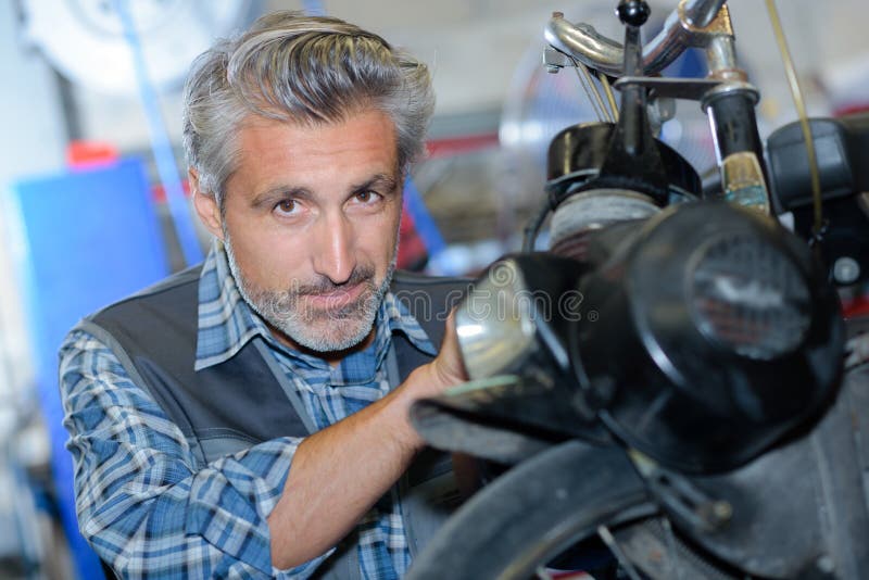 Man adjusting connection stock photo. Image of mechanic - 171369468