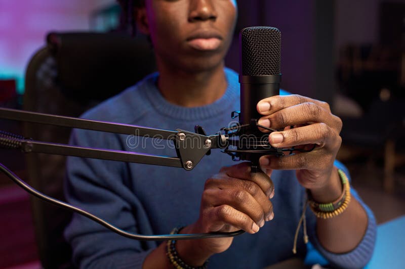 Man Adjusting Microphone in Professional Recording Studio Stock Image ...