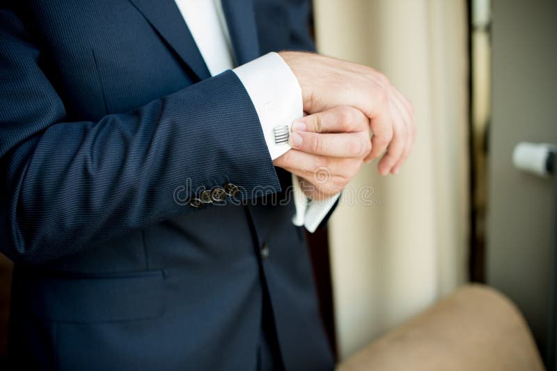 White shirt with cufflinks stock image. Image of hand - 6008907