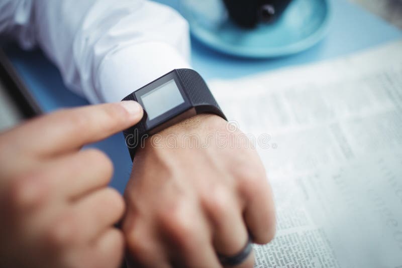 Man Adjusting Time on Smartwatch Stock Photo - Image of business ...