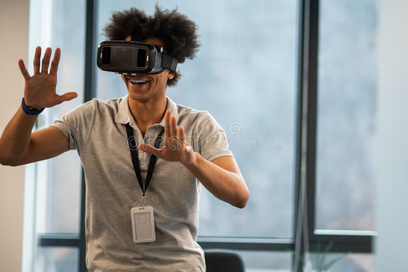 Man with Afro Hairstyle Using Vr Headset Interacting with Virtual ...
