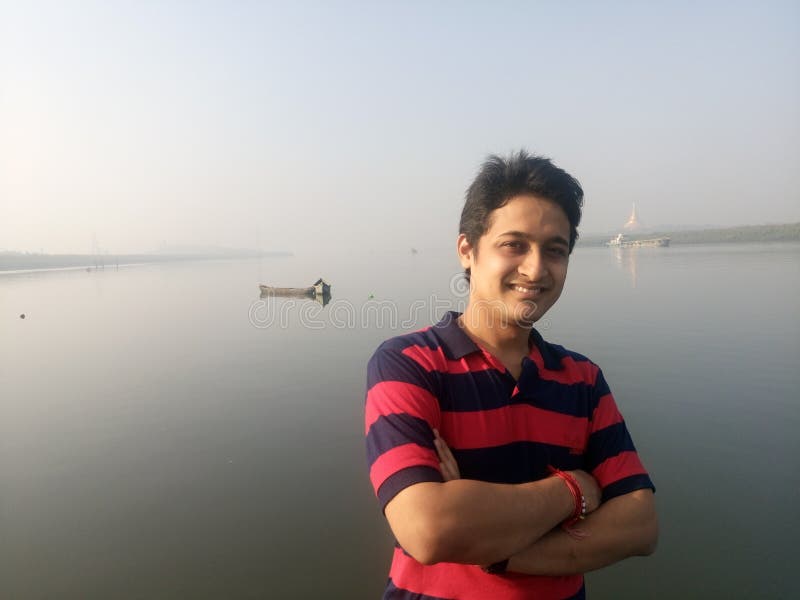 Man against sea stock image. Image of arms, portrait - 88276337