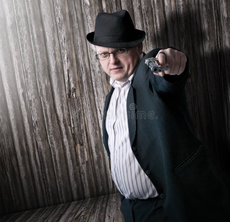 Man aiming with gun stock photo. Image of killer, handsome - 19499896