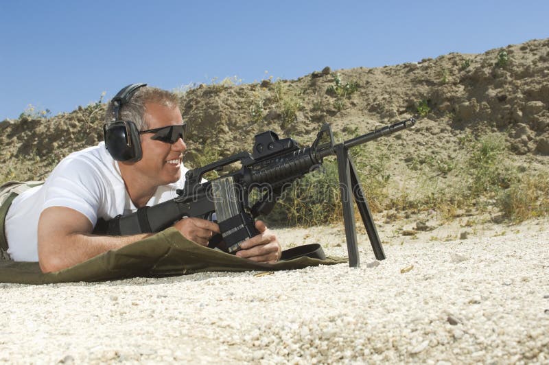 Shooting Gun Smile Stand Stock Photos - Free & Royalty-Free Stock ...