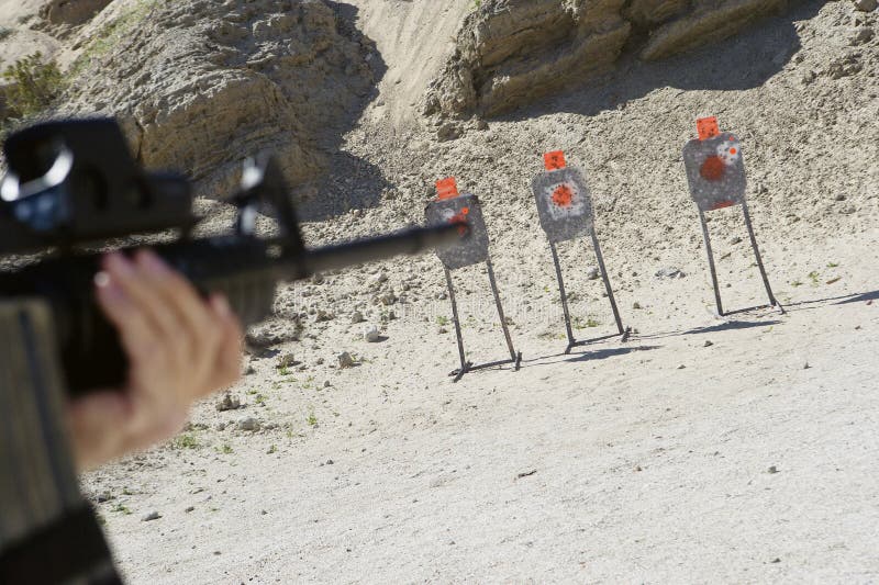 Man Aiming Machine Gun at Firing Range Stock Image - Image of people ...