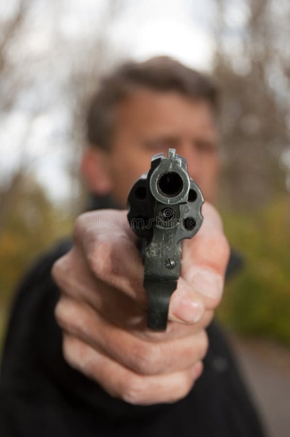 The man aims from revolver stock image. Image of security - 11333397