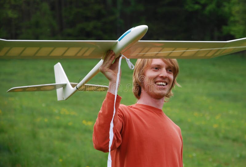 Man with aircraft model stock image. Image of flight, wing - 9332997