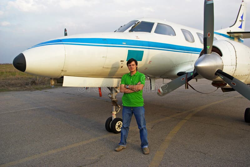 Man beside airplane stock image. Image of standing, summer - 4842227