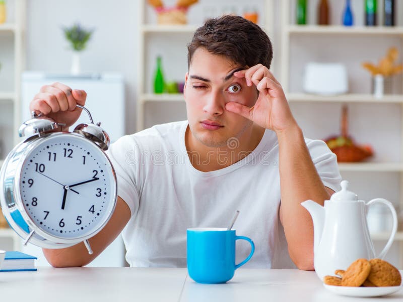 Man with Alarm Clock Falling Asleep at Breakfast Stock Image - Image of ...