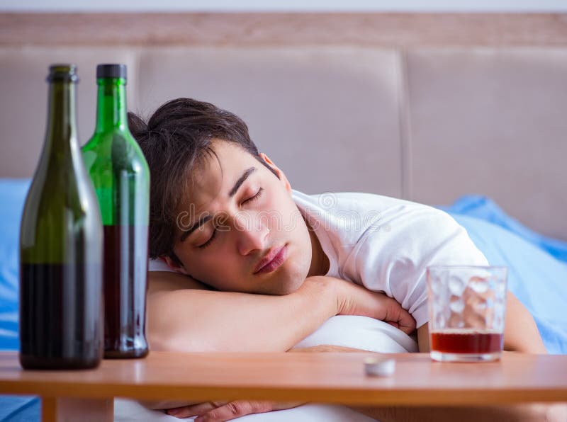 Man Alcoholic Drinking in Bed Going through Break Up Depression Stock ...