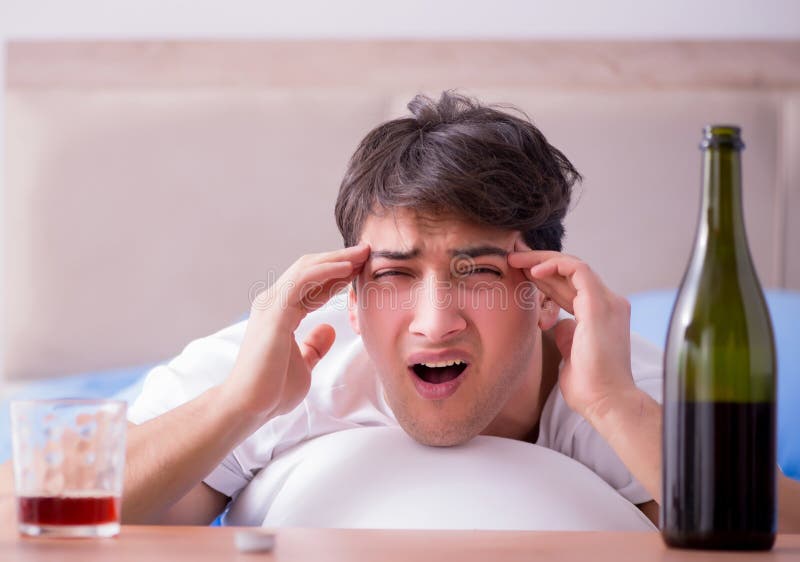 Man Alcoholic Drinking in Bed Going through Break Up Depression Stock ...