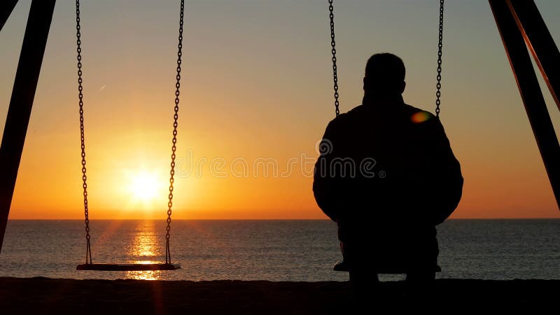 Man Alone Contemplating Sunset on the Beach Stock Video - Video of ...