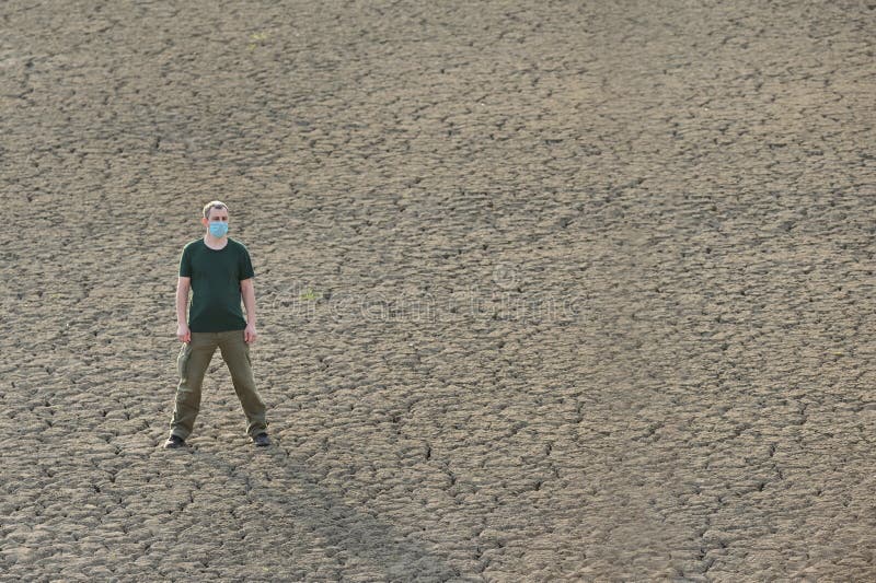 Man Alone on Cracked Soil stock image. Image of agriculture - 180825035