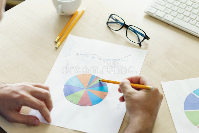 Man Analyzes the Data and Graphs. Business Analysis Concept Stock Image ...