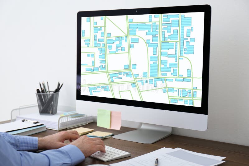 Man Analyzing Cadastral Map on Computer at Table, Closeup Stock Image ...