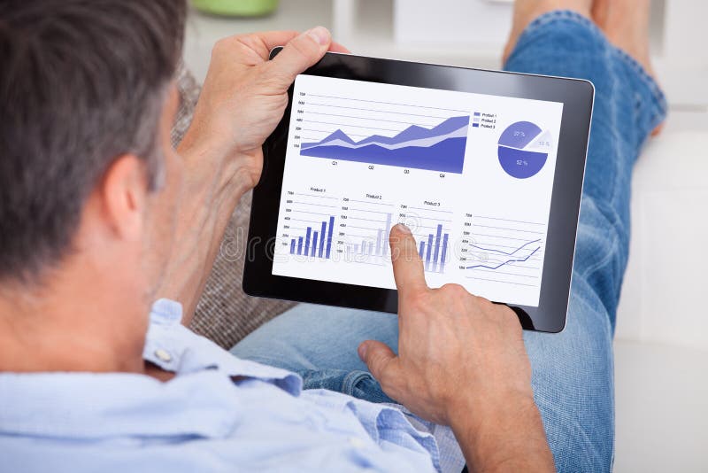 Man analyzing graph stock image. Image of company, improve - 46895407