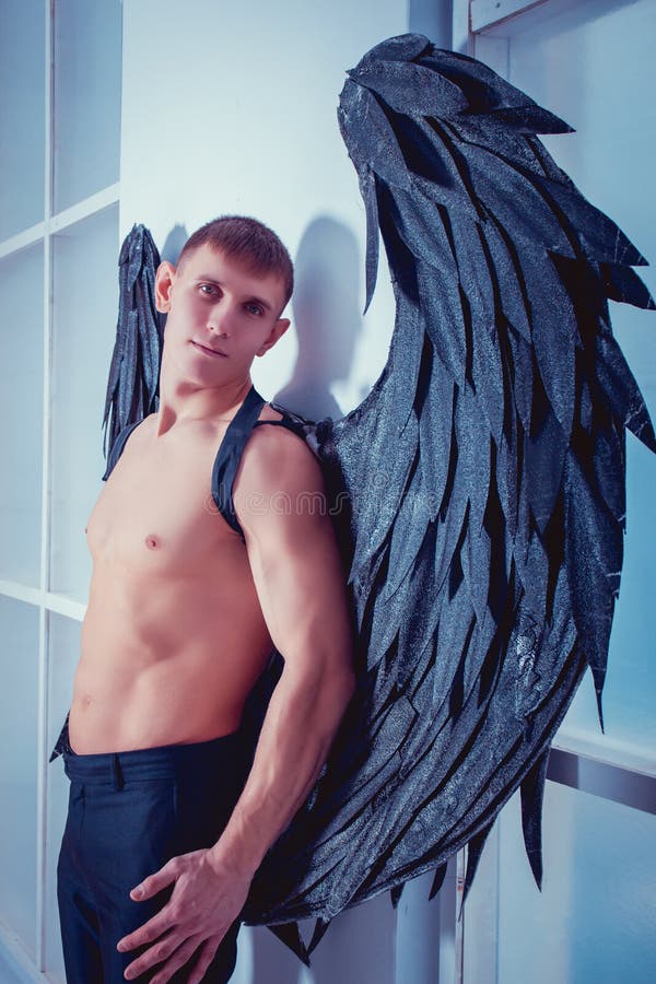 The man with angel wings stock image. Image of angels - 87649355
