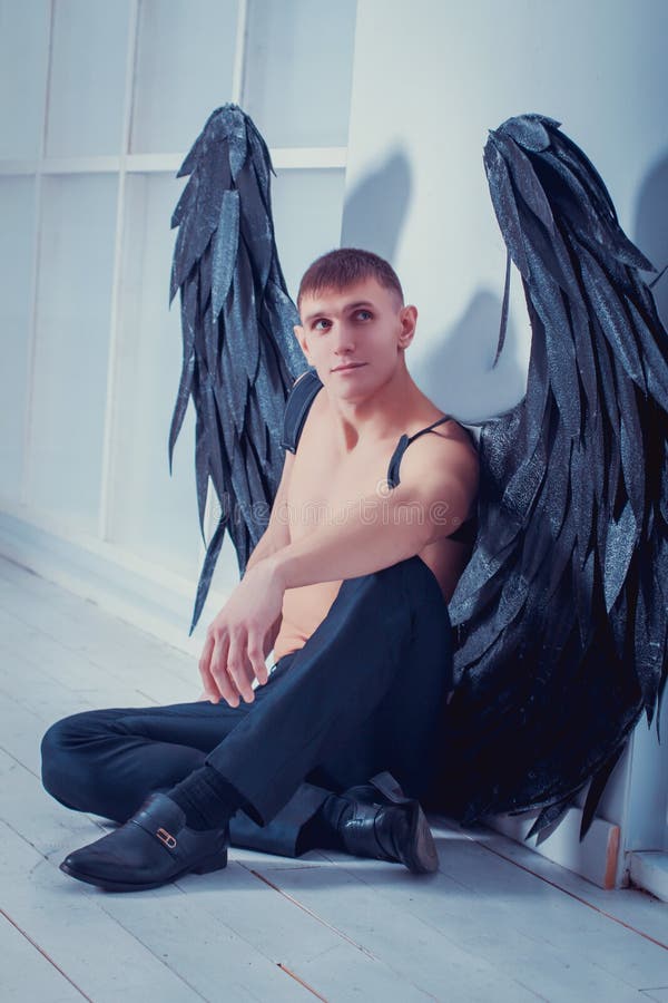 The man with angel wings stock photo. Image of beauty - 87649500