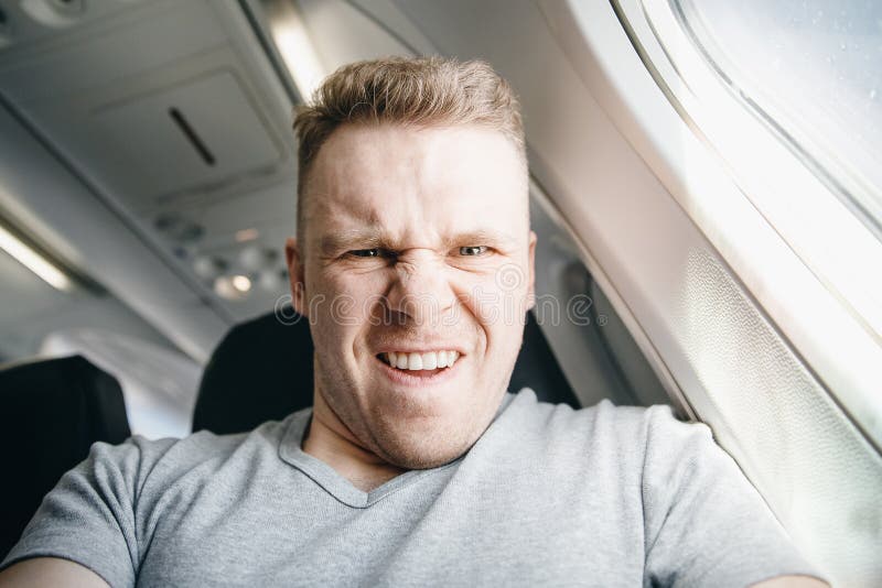 Man is Angry in Plane before Departure. Dissatisfaction with Service ...