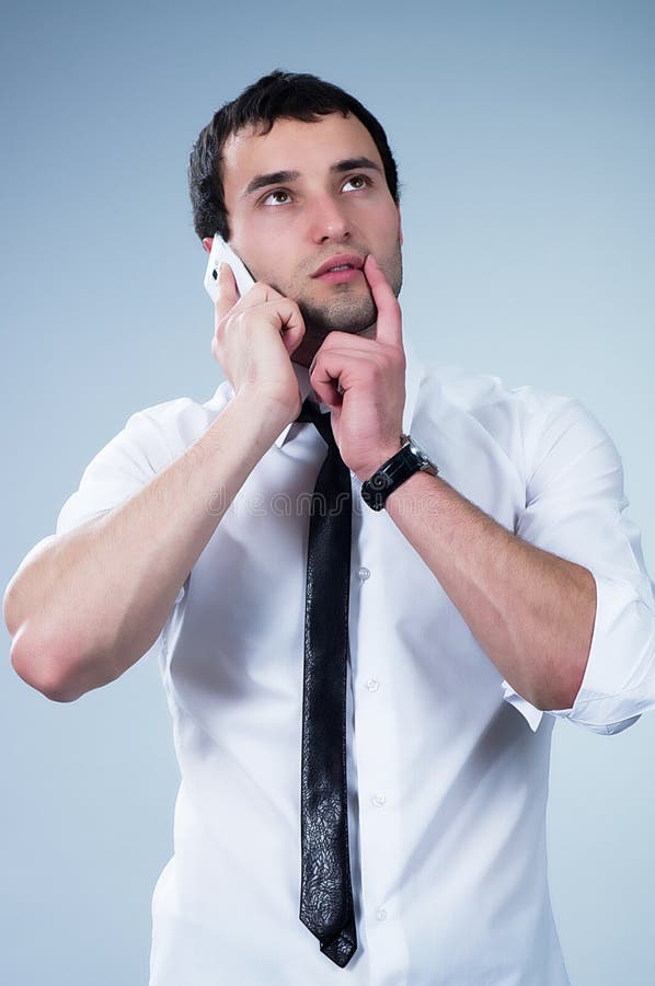 Nerdy Young Man in Suspenders on the Phone Stock Image - Image of front ...