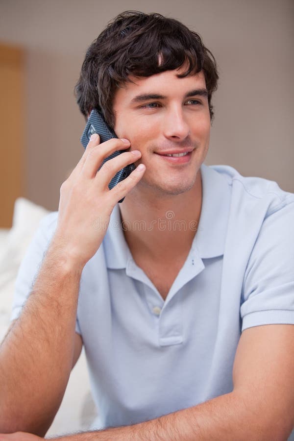 Man answering phonecall stock image. Image of joyful - 22361131