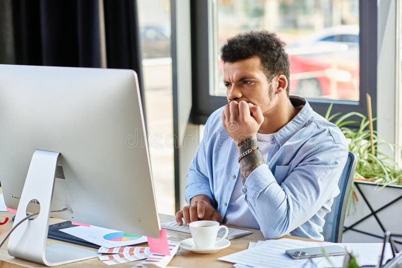 Focused Man Working Intently at Desk Stock Photo - Image of planning ...