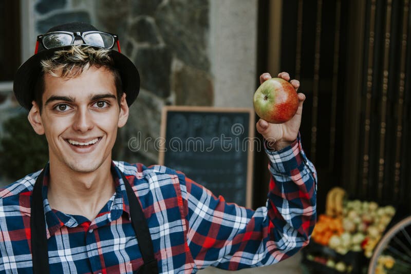Man with apple stock image. Image of health, attractive - 78994369