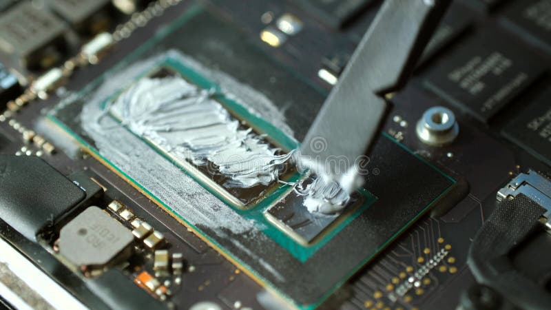 Man Applies Small Dot of Thermal Paste To Laptop Processor Stock Video ...