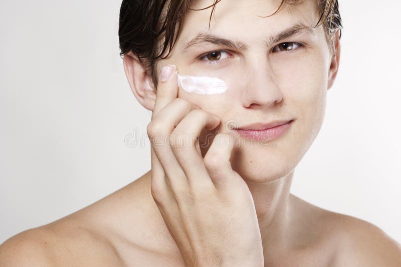 Man applying cream stock photo. Image of luxury, applying - 16724482