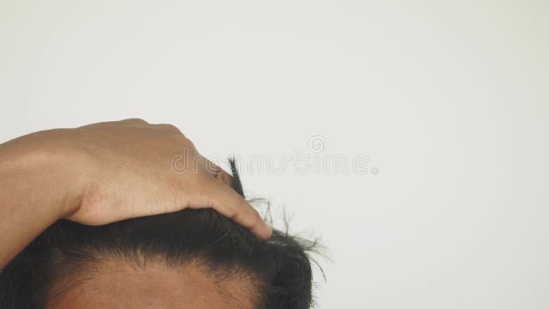 Man applying oil on hair stock video. Video of hand - 338165817