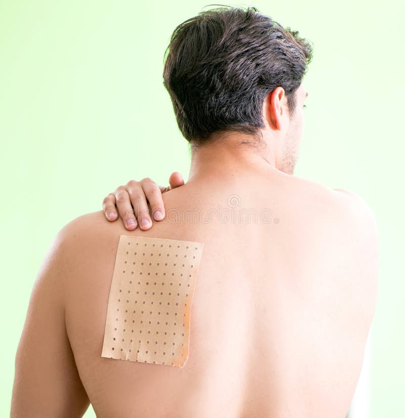 Man Applying Pepper Capsicum Plaster To Relieve Pain Stock Image ...