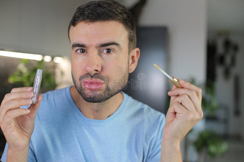 Man Applying Very Shiny Lip Gloss Stock Photo - Image of balm, product ...