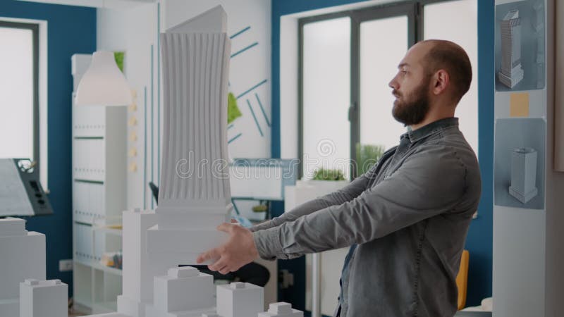 Man Architect Analyzing Building Model and Maquette To Design Urban ...