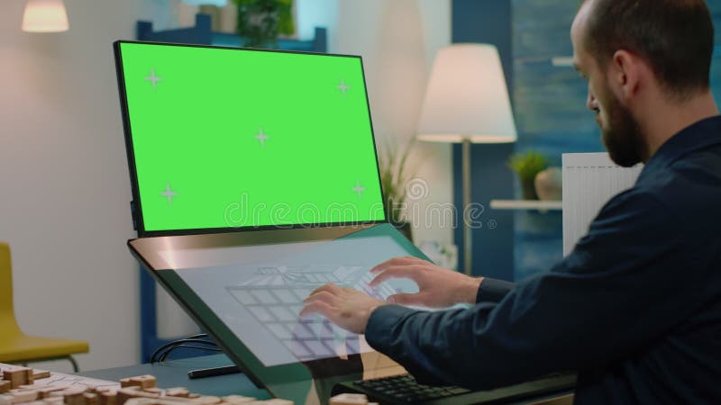 Man Architect with Green Screen Analyzing Building Model Stock Footage ...