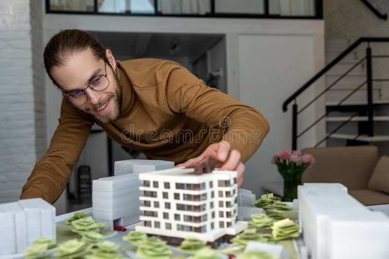 Man Architect Working in Office on Creation of New Residential Complex ...