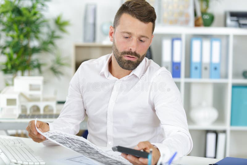 Man during Architectural Drawings Calculations Stock Photo - Image of ...