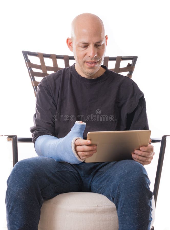 Young Man with an Arm Cast Talking on His Phone Stock Photo - Image of ...