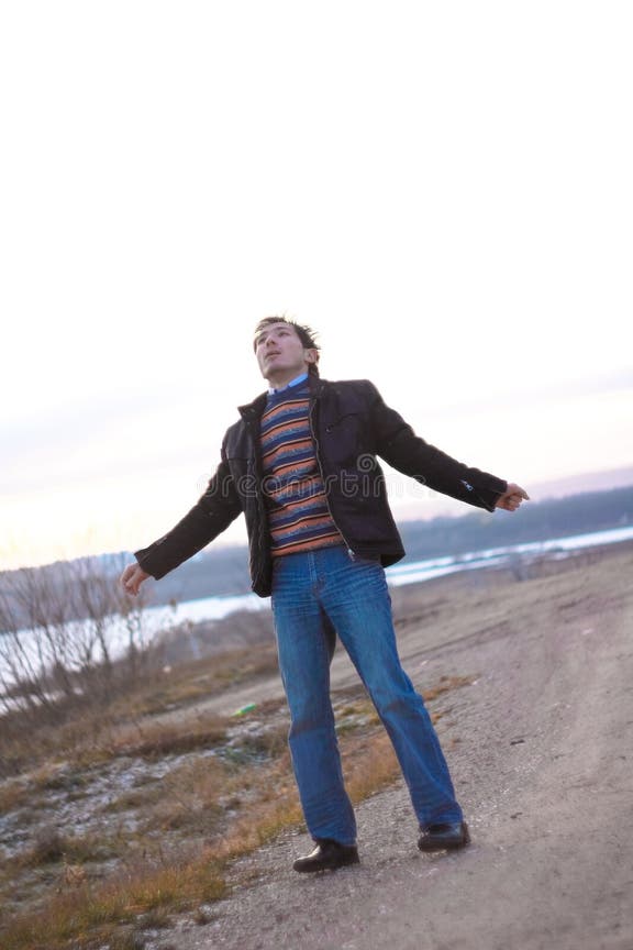 Man with arms wide open stock photo. Image of young, face - 12222526