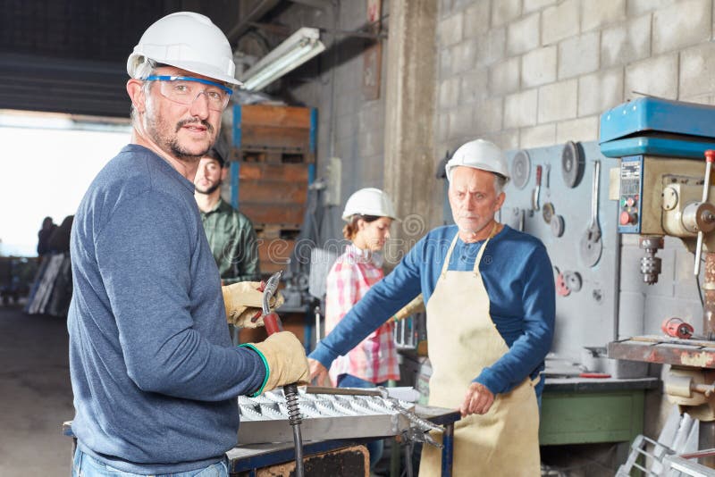 Man As Blue Collar Worker with Welding Machine Stock Image - Image of ...