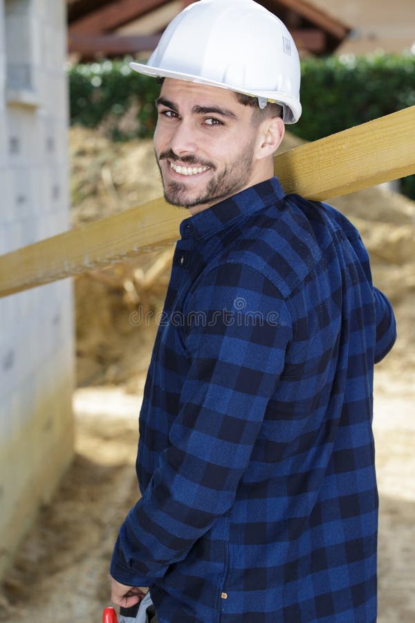 Man As Builder Carrying Wood and Working Stock Photo - Image of ...
