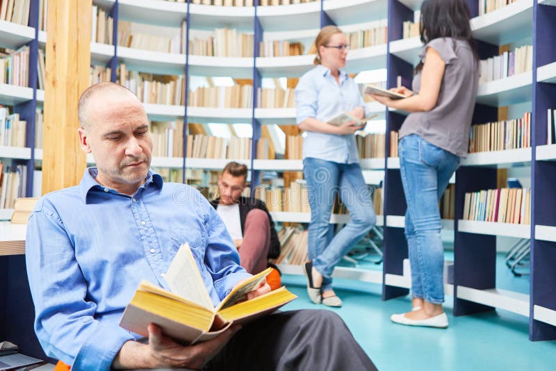 Man As a Lecturer Reading the Book in the Reading Room Stock Image ...