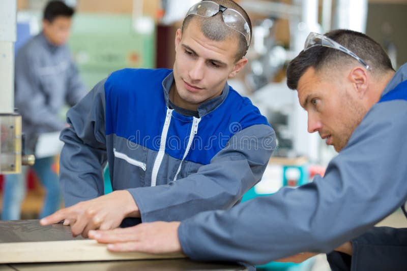 Man as wood apprentice stock image. Image of test, production - 258027983