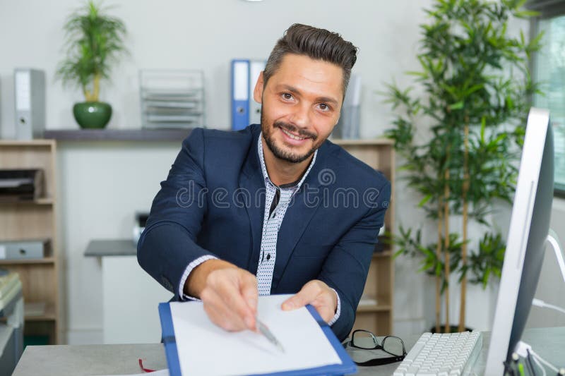 Man Asking for Signature in Office Stock Photo - Image of financial ...