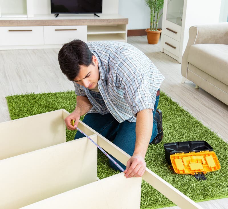 Man Assembling Furniture at Home Stock Photo - Image of installing ...