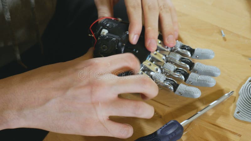 Innovative Cybernetic Device. Futuristic Bionic Arm in Action Stock ...