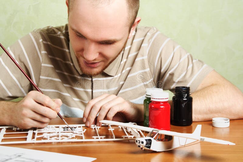 Man Assembling Plastic Airplane Model Stock Image - Image of model ...