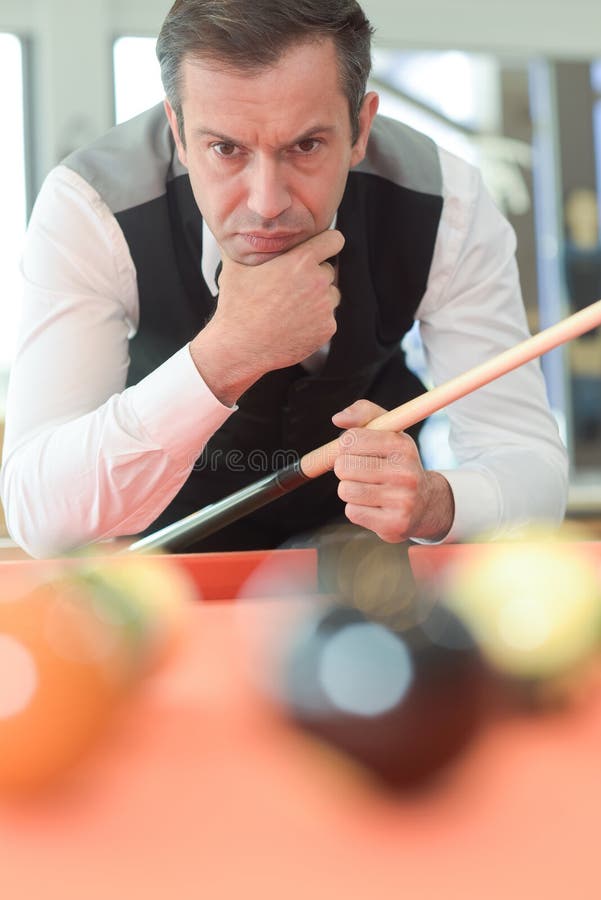 Man Assessing Balls on Pool Table Stock Photo - Image of waistcoat ...