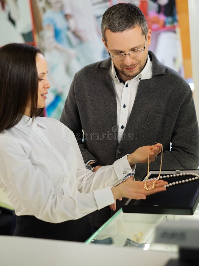 Man with Assistant in Jewellery Shop Stock Image - Image of boutique ...